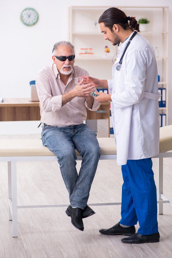Old Blind Man Visiting Young Male Doctor Stock Image - Image of glasses ...