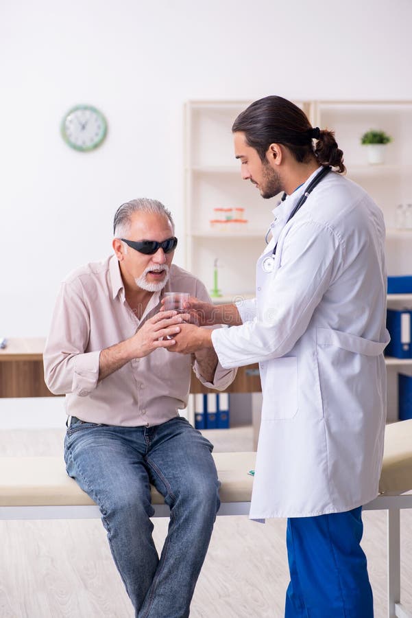 Old Blind Man Visiting Young Male Doctor Stock Photo - Image of ...