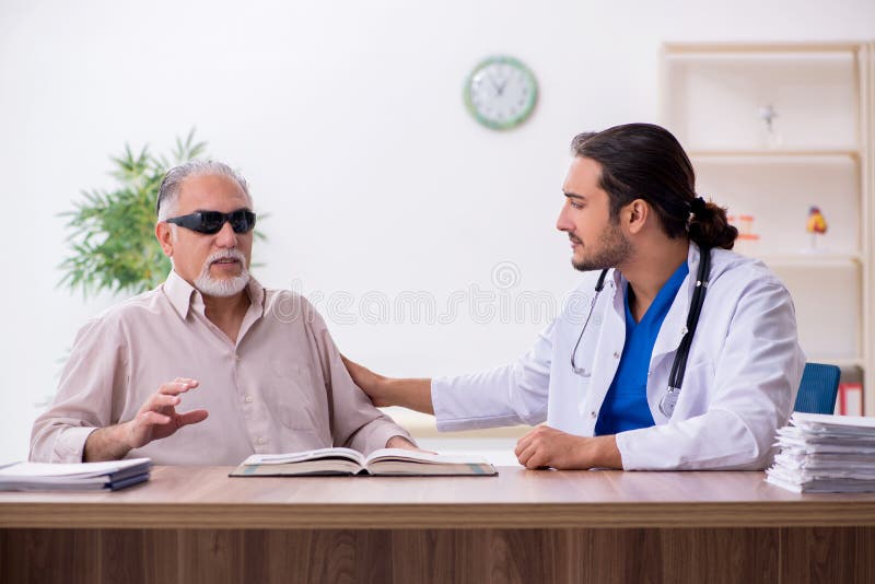 Old Blind Man Visiting Young Male Doctor Stock Photo - Image of ...