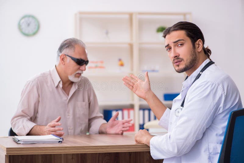 Old Blind Man Visiting Young Male Doctor Stock Photo - Image of care ...