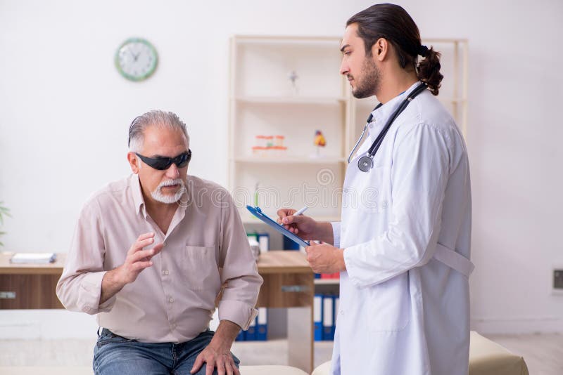 Old Blind Man Visiting Young Male Doctor Stock Image - Image of ...