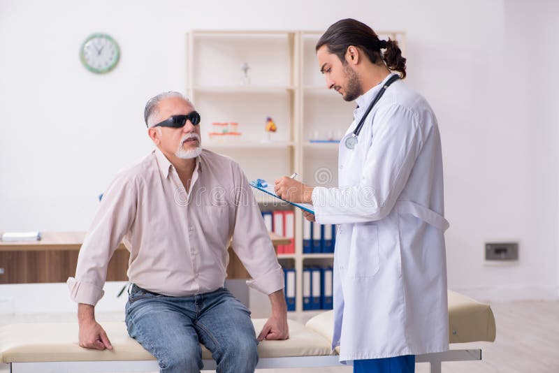 Old Blind Man Visiting Young Male Doctor Stock Image - Image of ...