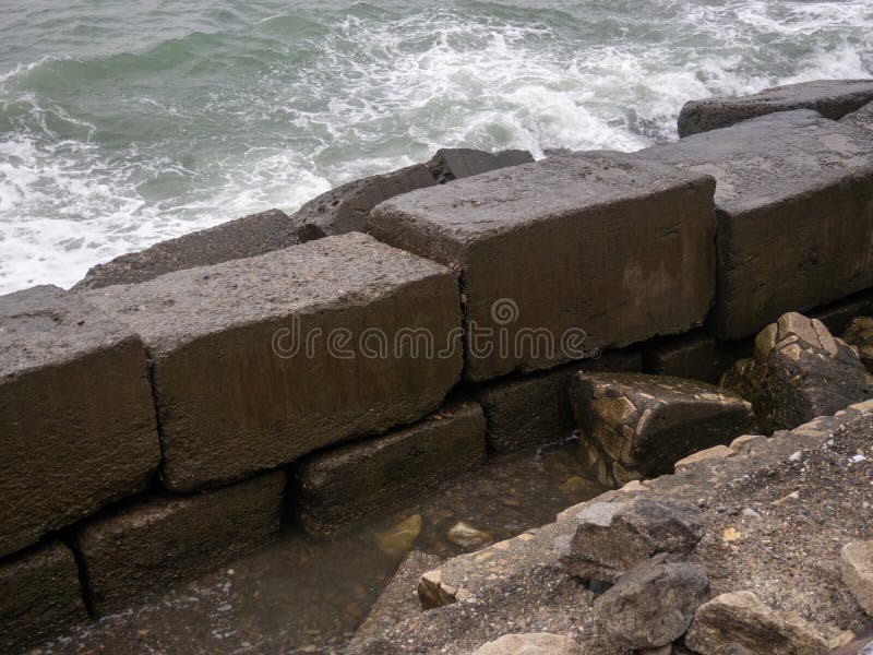 Old Blocks of Fortifications of the Coast. Concrete Structures on the ...