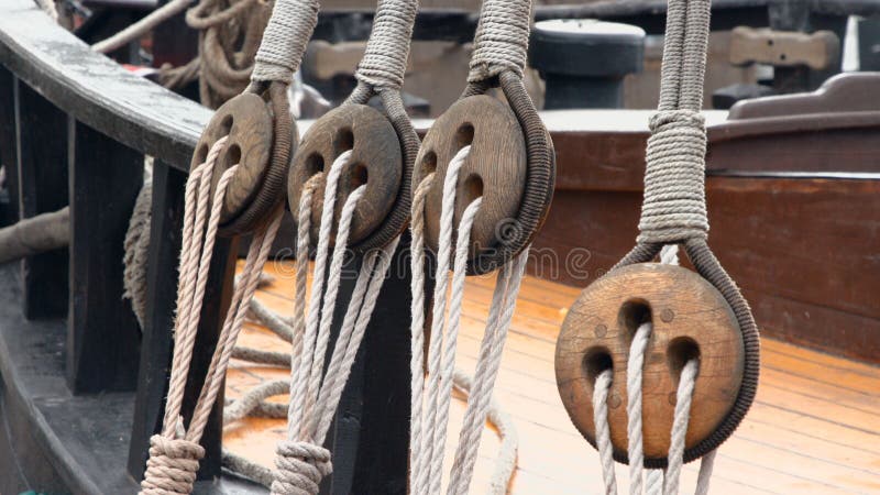 Old Blocks and Rigging on a Wooden Ship Stock Photo - Image of knot ...