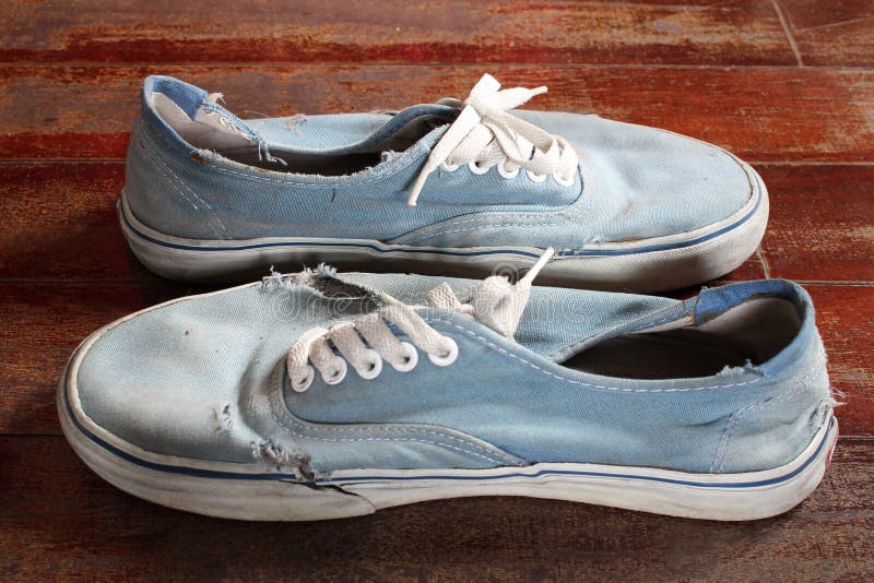 Old blue canvas shoe stock photo. Image of brown, discard - 40364424