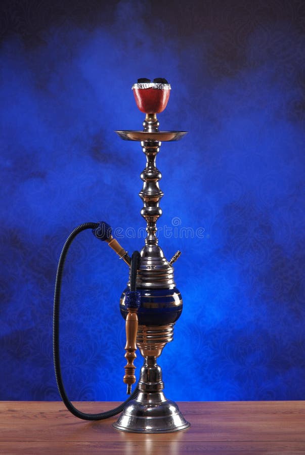 An Old Blue Ceramic Hookah on a Blue Background Stock Photo - Image of ...