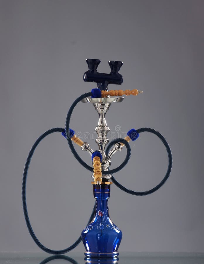 An Old Blue Ceramic Hookah on a Blue Background Stock Photo - Image of ...