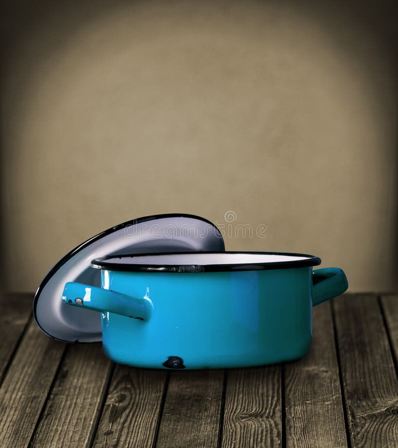 Old Blue Enameled Pot on a Wooden Table Stock Photo - Image of domestic ...