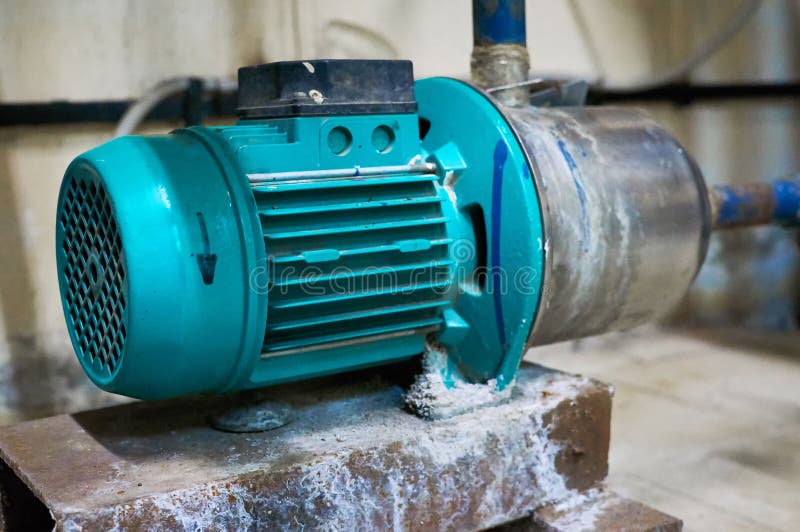 Old Blue Engine with a Pump Standing on a Metal Stand. Stock Image ...
