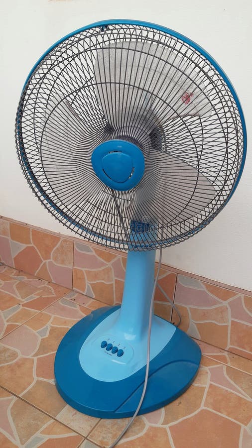 Old Blue Fan on a White Wall. Stock Photo - Image of technology ...
