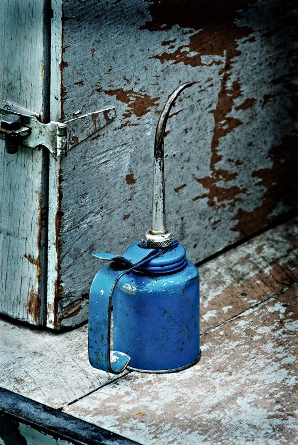 Old blue oil can stock photo. Image of oilcan, dinted - 3142966