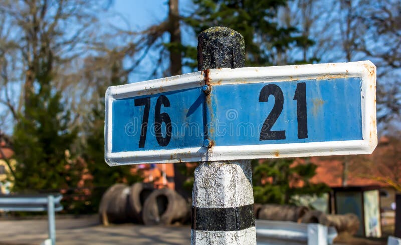 Old blue road signpost stock image. Image of blue, element - 245059839