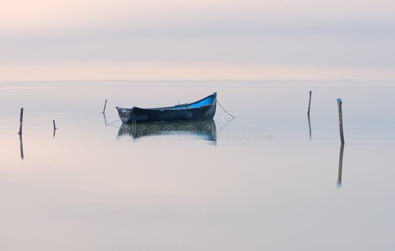 Old Blue Rowboat on the Lake at Sunset Stock Photo - Image of idyllic ...