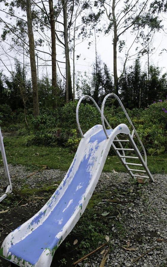 Old Blue Slide in Playground Stock Image - Image of blue, architecture ...