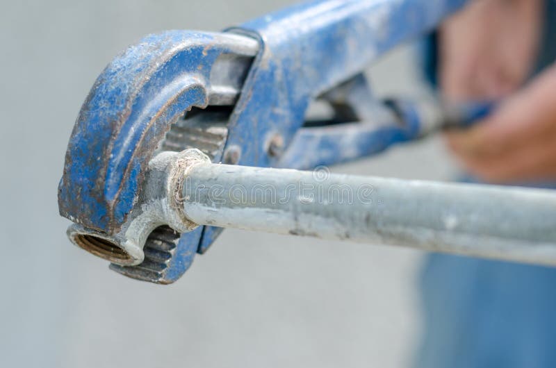Old Blue Wrench Unwind Elbow from Pipe, Close Up Stock Image - Image of ...
