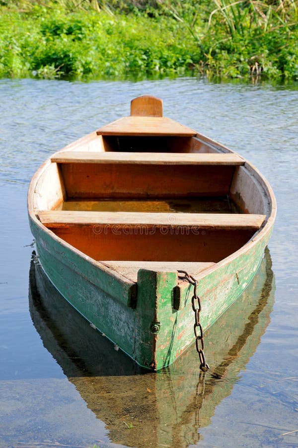 Old boat stock image. Image of lake, green, coast, cane - 11343991