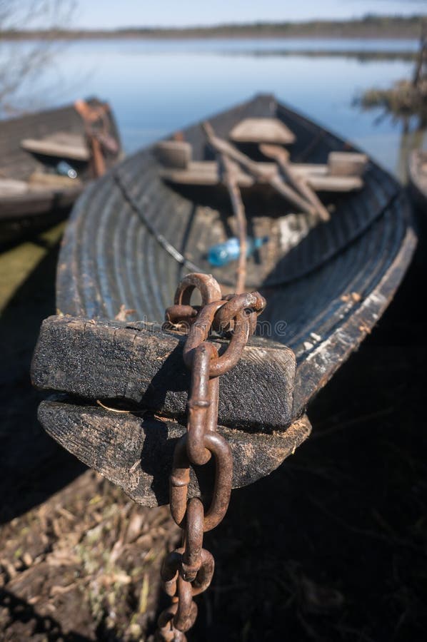 Old boat on the chain stock image. Image of transportation - 53753177