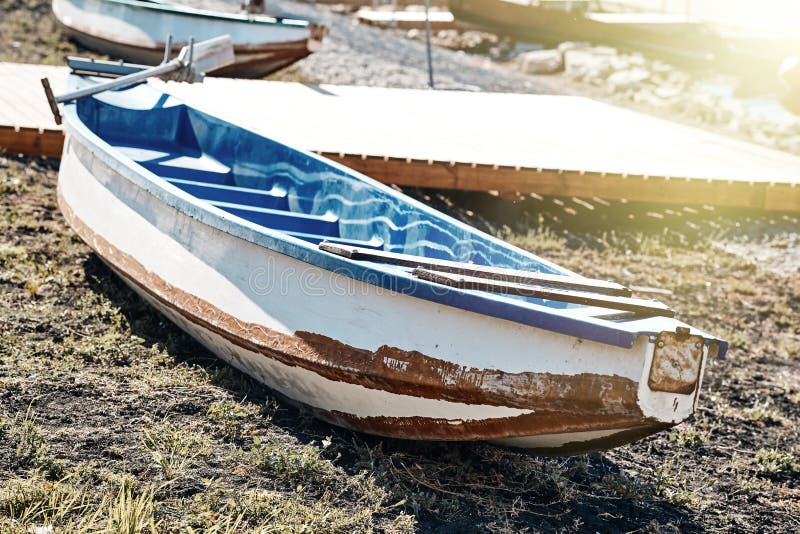 An Old Boat Lies on the Shore. Stock Photo - Image of fishing ...