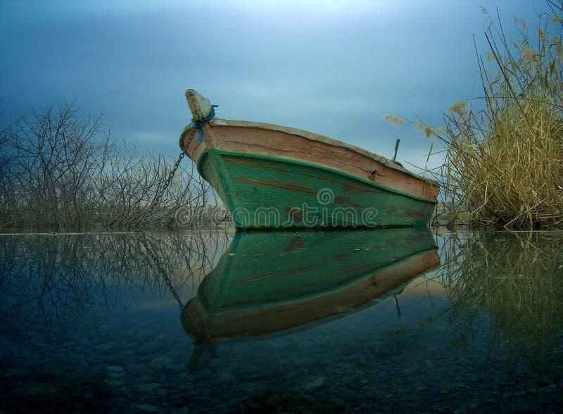 Old boat on water stock photo. Image of outdoors, rowboat - 23360106
