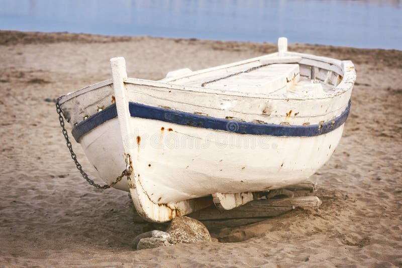 Old boat on the sand stock image. Image of color, boat - 105683379