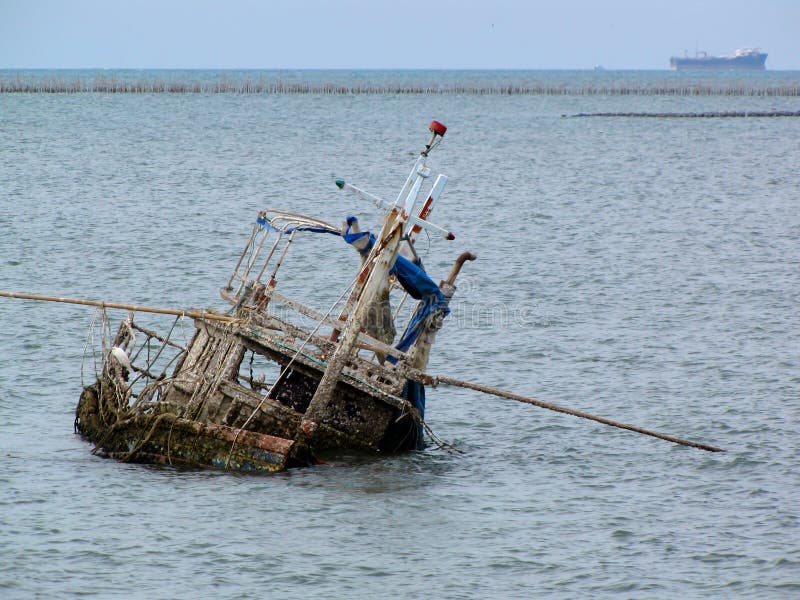 The old boat in the sea stock image. Image of lean, sunken - 16517145