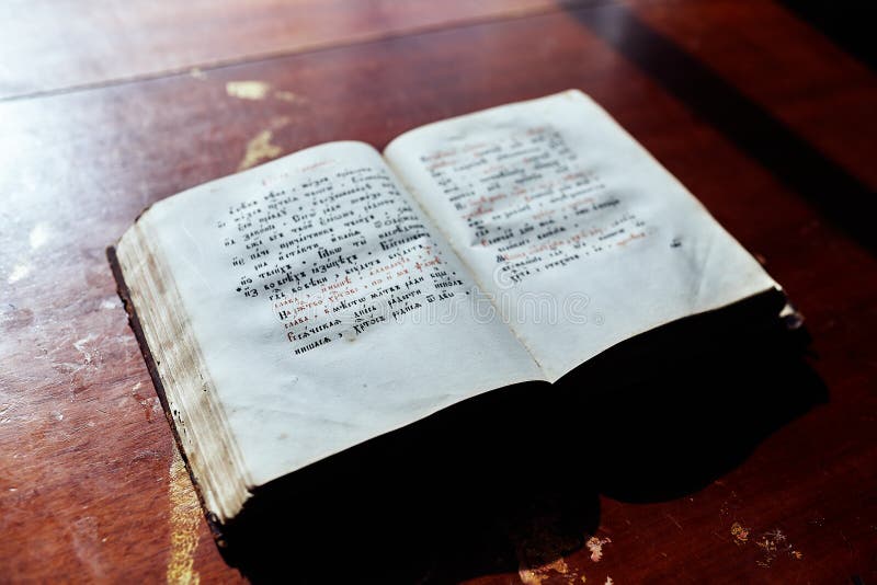 Old Book with Ancient Text on a Wooden Table Stock Image - Image of ...