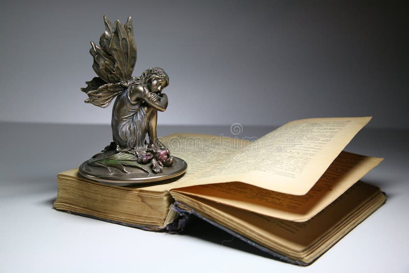 Angel With The Book On A Grey Background Stock Photo - Image of reading ...
