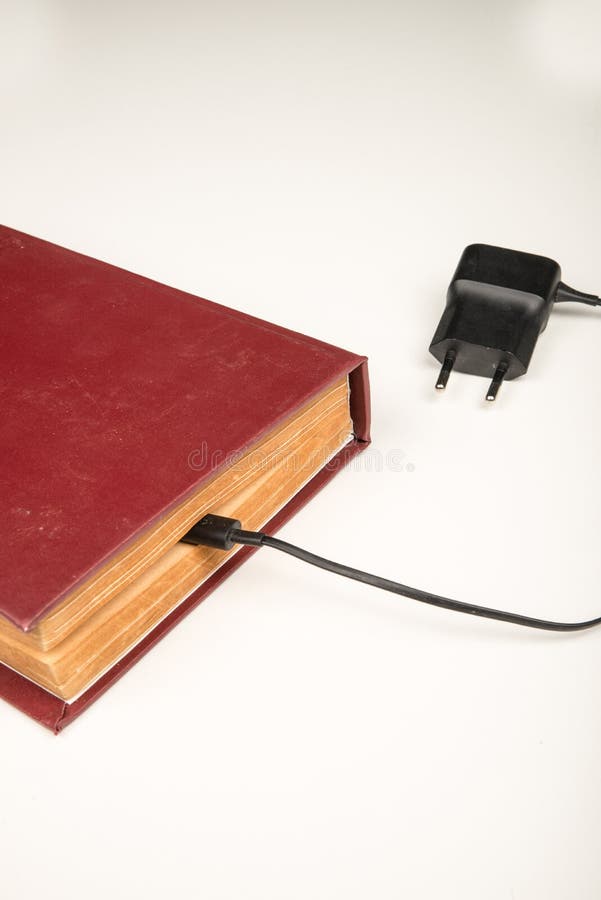 Old Book with a Battery Charging Cable Stock Image - Image of ...
