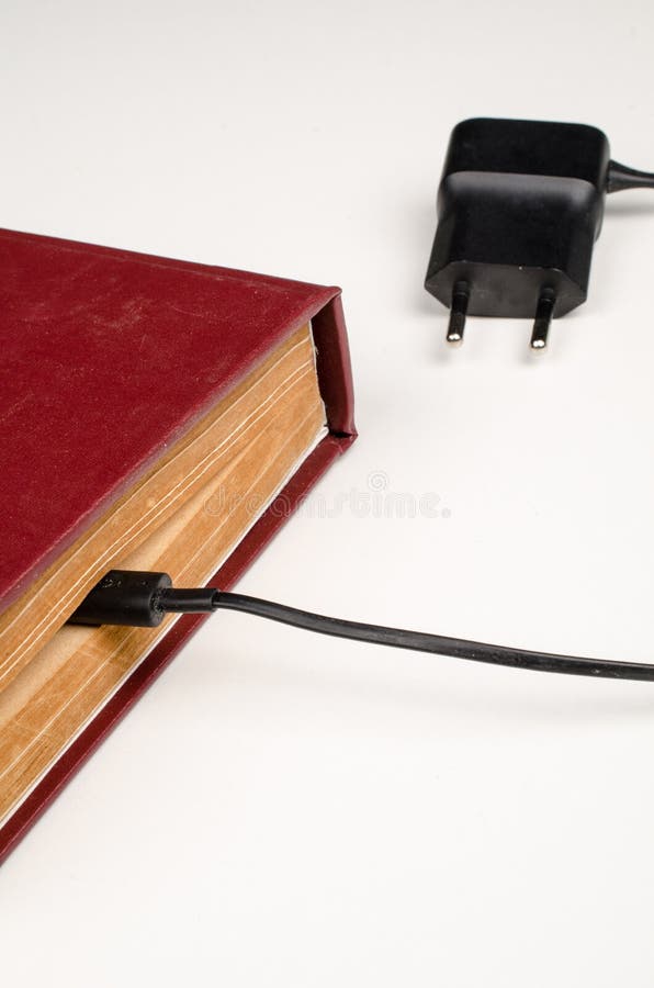 Old Book with a Battery Charging Cable Stock Image - Image of classic ...