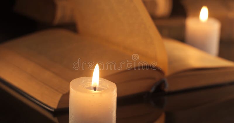An Old Book and Burning Candles Stock Image - Image of textbook ...