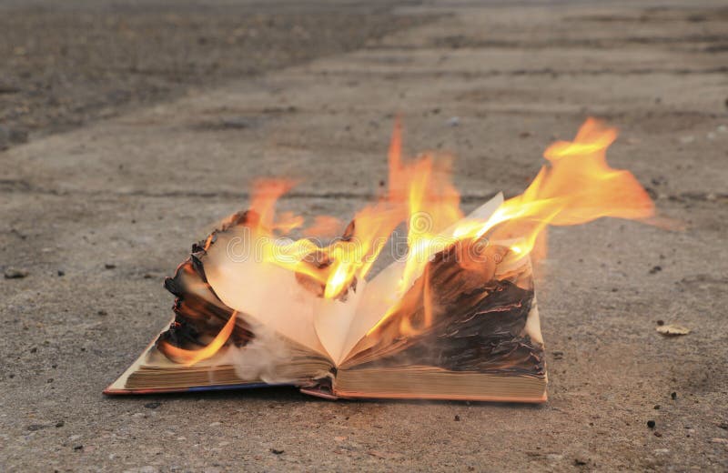 Book with Burning Pages on a Concrete Surface Stock Photo - Image of ...