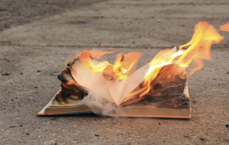 Book with Burning Pages on a Concrete Surface Stock Image - Image of ...