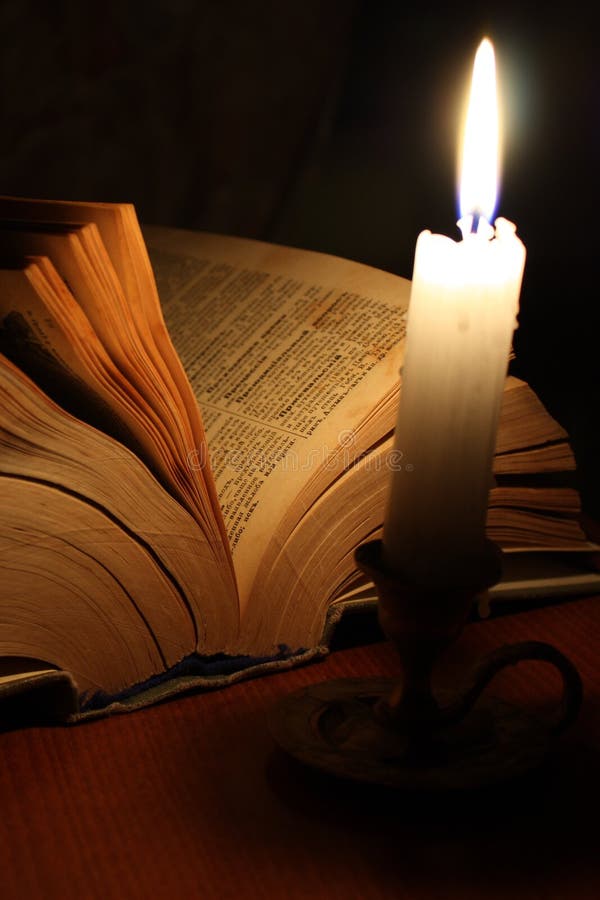 Old book and candle stock photo. Image of darkness, heat - 11894952