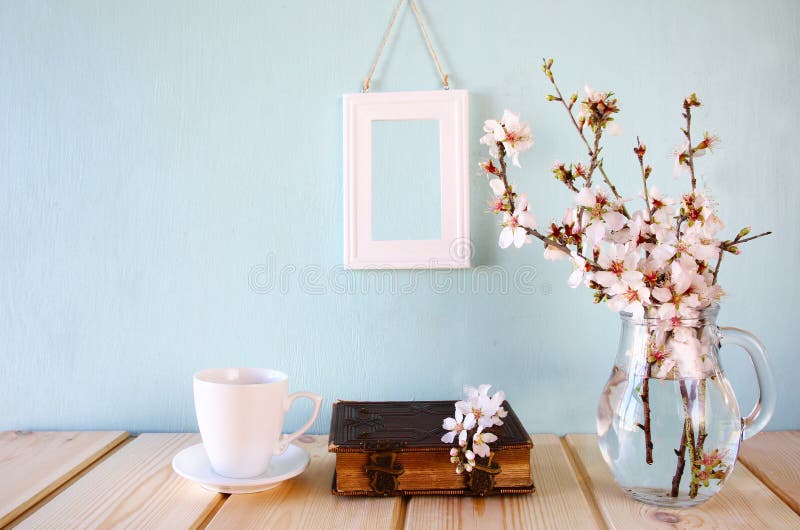 Old Book, Cup of Coffee Next To Spring White Flowers Stock Image ...
