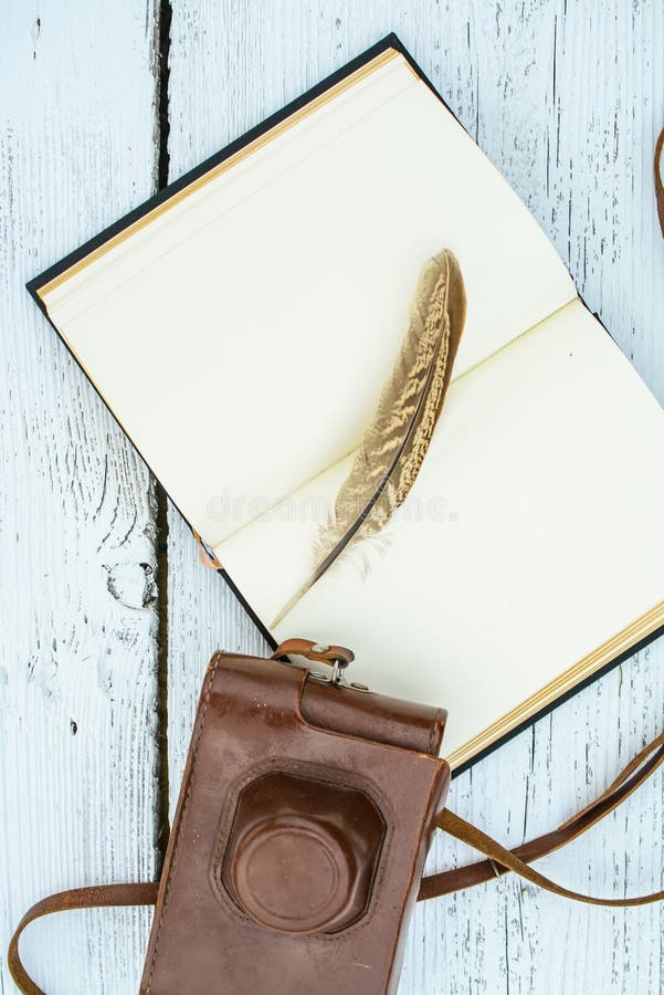 Old Book and Feather Pen on Vintage White Wooden Table Stock Image ... Old Book and Feather Pen on Vintage White Wooden Table Stock Image ...