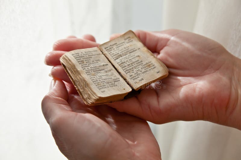 Old book in hands stock photo. Image of people, holding - 55410844