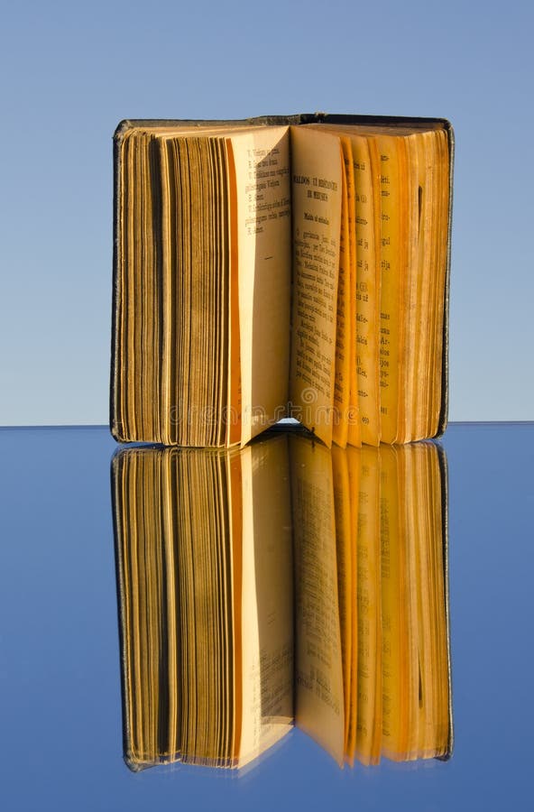 Old Book on Mirror and Reflection Stock Image - Image of book, grunge ...
