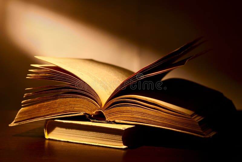 Ray of Light Shining from a Book Stock Photo - Image of open, highlight ...