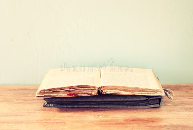 Old book over wooden shelf stock image. Image of design - 39913359