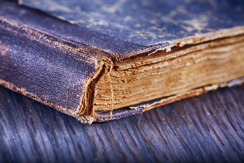 Old book over wooden table stock photo. Image of texture - 123619090