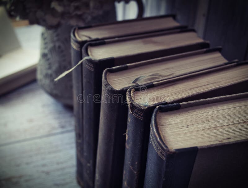 Old book on a wooden table stock photo. Image of literature - 268949856