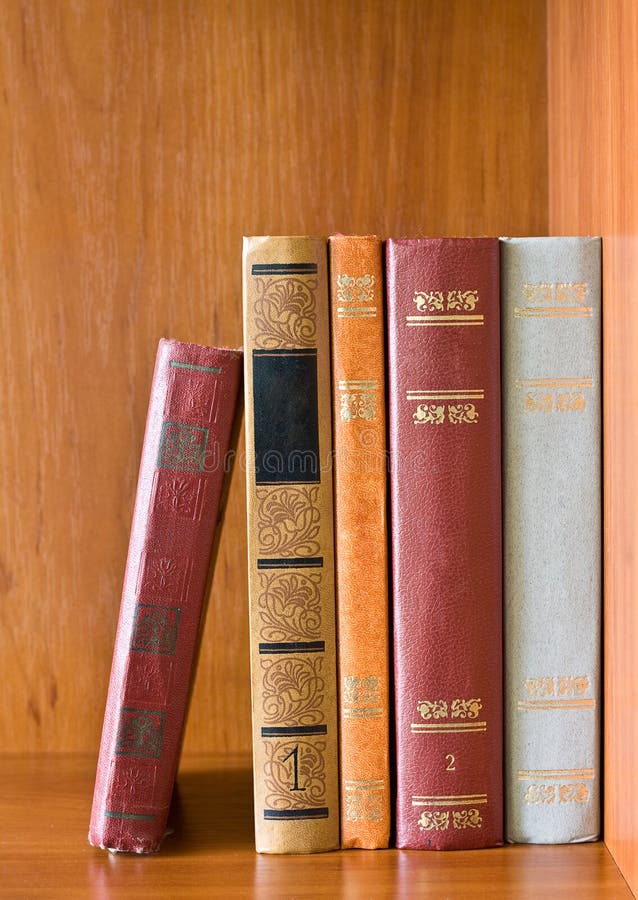 Old Books in a Row in Library on Black Background with Copy-Space Stock ...