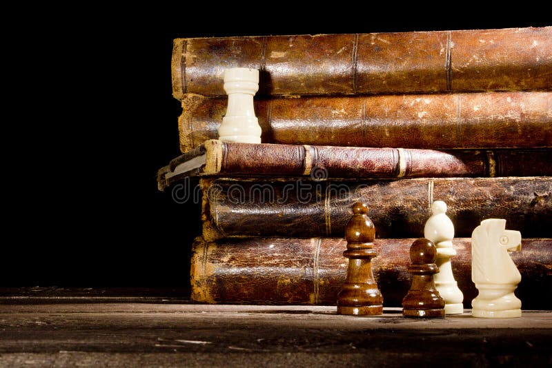 Old books and chess pieces stock image. Image of bookcase - 73399751