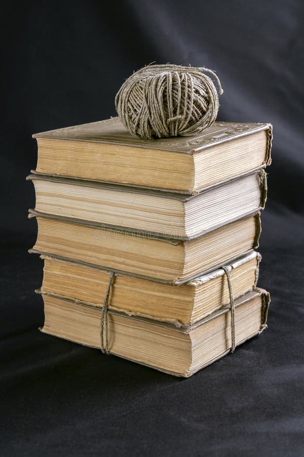 Old Books and Coil with Threads Stock Photo - Image of album, fabric ...