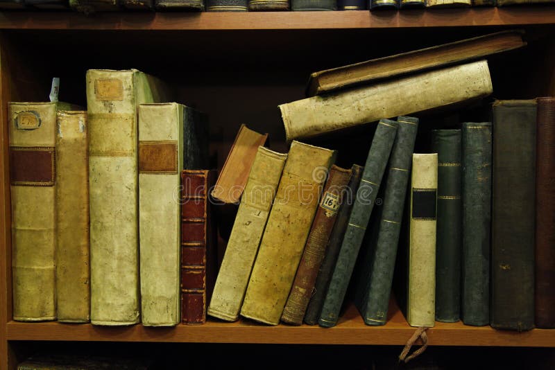 Old books on shelf stock photo. Image of cover, brown - 34491438