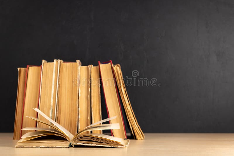 Books on a Table, with One Book Open Stock Photo - Image of novel ...