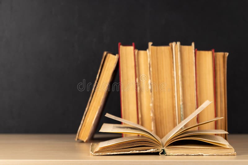 Books on a Table, with One Book Open Stock Photo - Image of novel ...