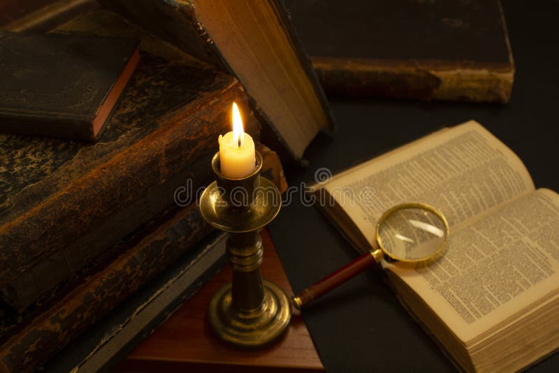 Old Books on the Table, Reading by Candlelight Stock Photo - Image of ...