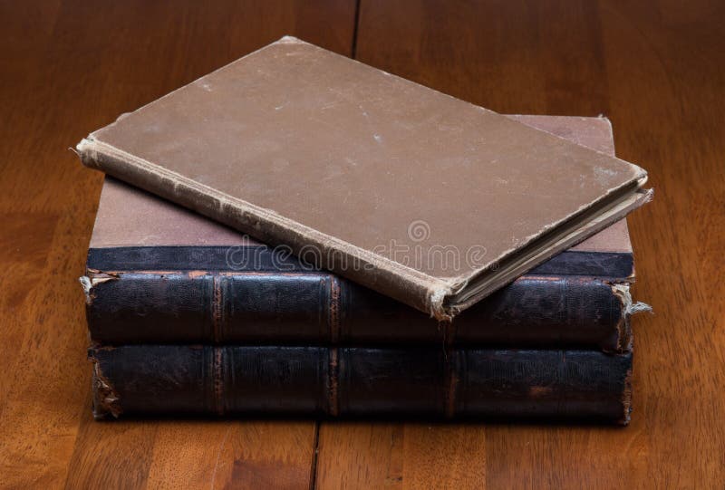 Old books on table stock image. Image of brick, paper - 164930947