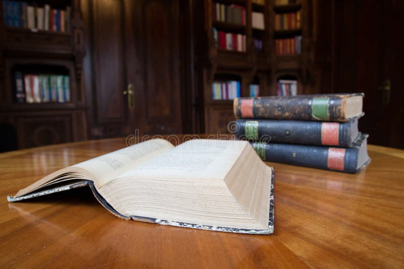 Old books on a table stock image. Image of information - 34524869